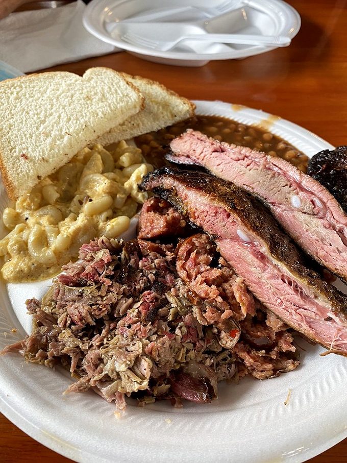 The holy trinity of barbecue&mdash;pulled pork, ribs, and mac and cheese&mdash;a plate that would make even vegetarians question their life choices.