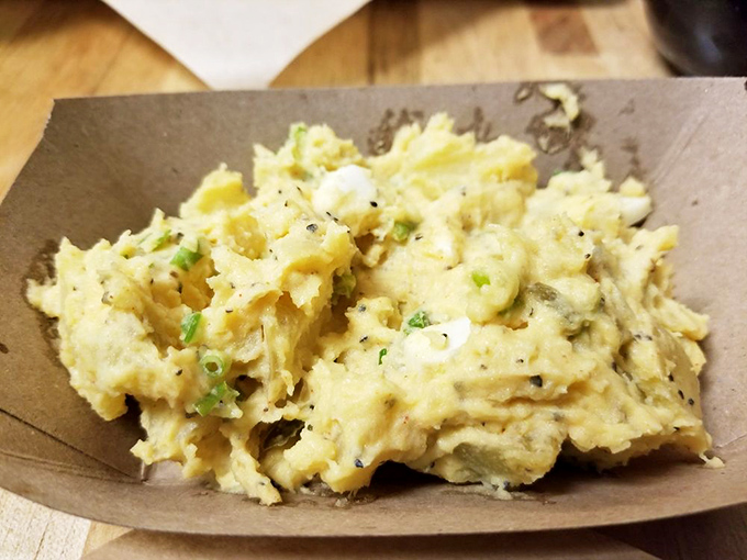 Potato salad that refuses to be a mere sidekick. This creamy, herb-flecked concoction demands equal billing with whatever meat it accompanies.