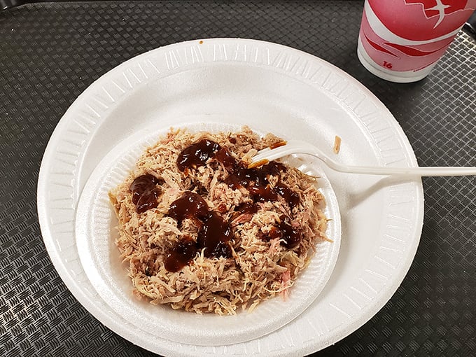 Barbecue in its purest form&mdash;a heap of finely chopped pork with sauce, where every forkful is a direct line to happiness.