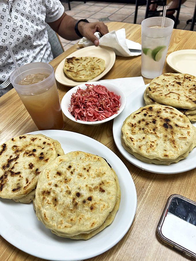 Pupusas with curtido &ndash; the perfect relationship. These griddled corn cakes with their pickled cabbage companion are Central America's greatest love story.