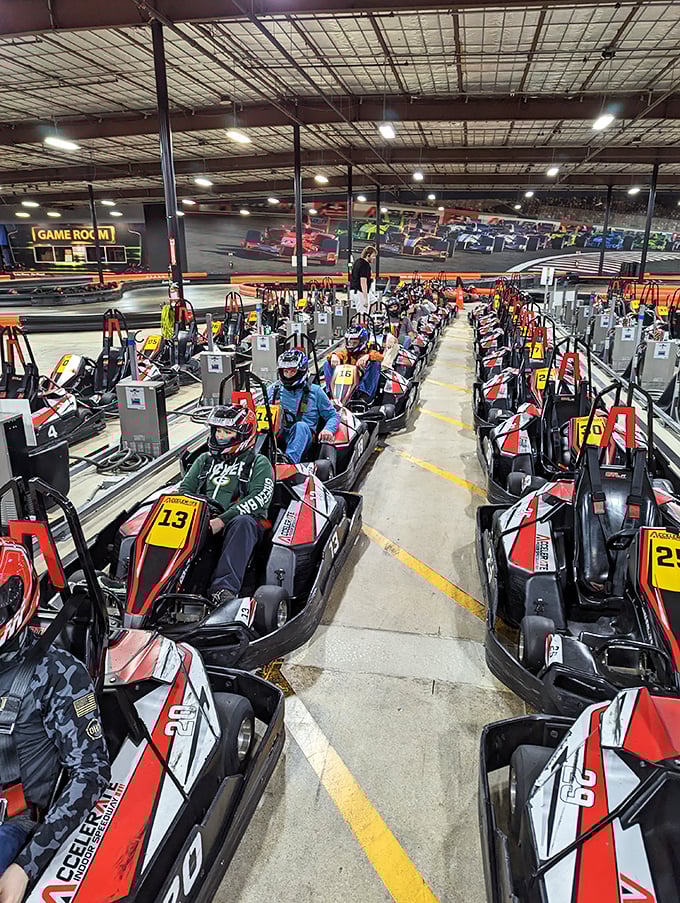 The starting grid fills with anticipation. Drivers adjust helmets and grip steering wheels, each silently plotting their path to victory.