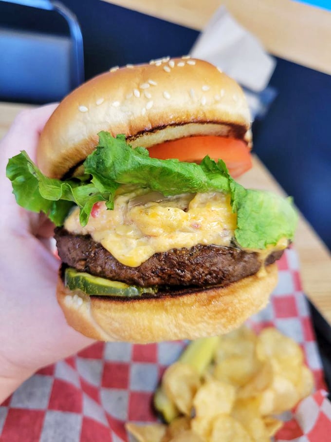 This isn't just a burger&mdash;it's a towering achievement of beef, cheese, and fresh veggies that requires jaw exercises before attempting to take the first bite.
