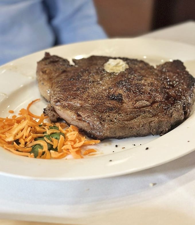 A perfectly seared ribeye with that magical crust that makes steak lovers weak at the knees. Simplicity that speaks volumes.
