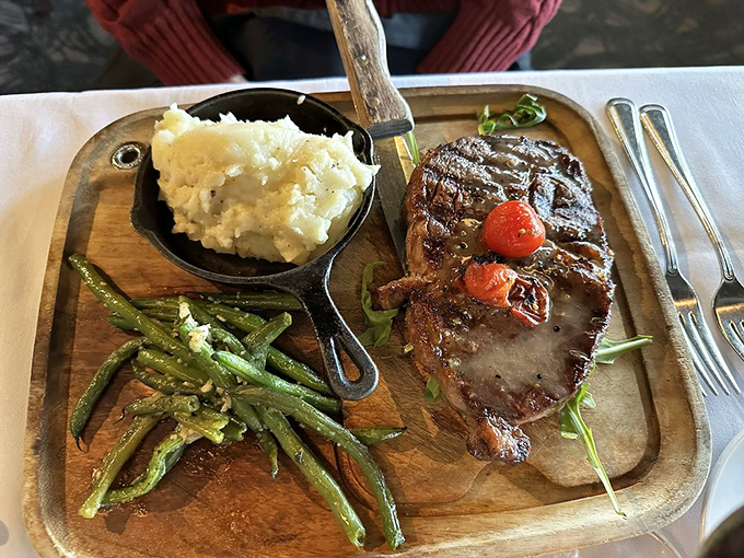 This ribeye doesn't just sit on the plate &ndash; it commands attention. The kind of steak that makes conversation stop mid-sentence.