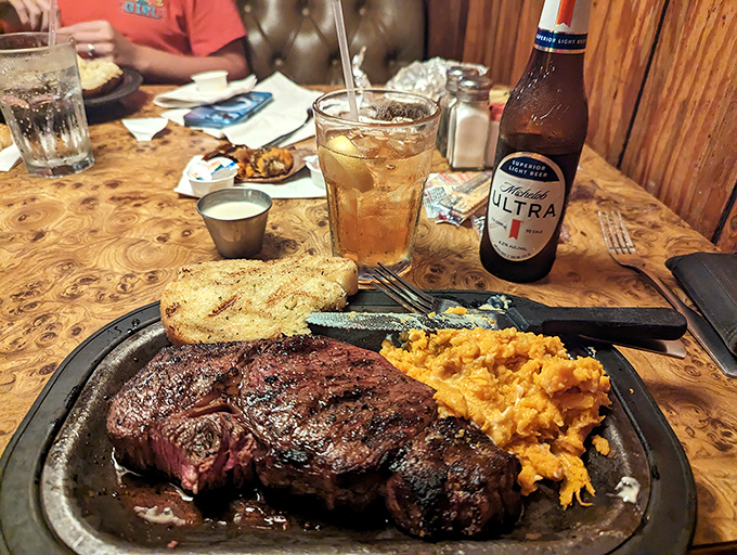 This ribeye steak doesn't need fancy garnishes or architectural presentation - just honest beef, sweet potato, and the dignity of being perfectly cooked.