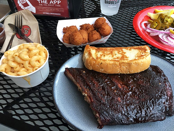 BBQ architecture 101: Build your foundation with mac and cheese, frame it with Texas toast, and crown it with ribs that surrender at first bite.