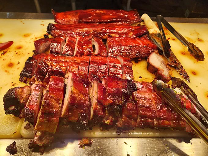 Glistening BBQ pork sliced to perfection, where each piece promises that perfect combination of sweet glaze and savory meat.