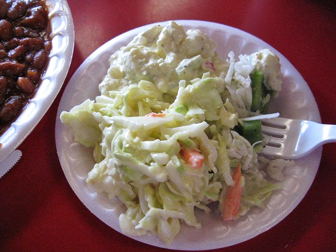 Creamy coleslaw that doesn't just accompany the barbecue but performs a perfect cooling counterpoint to all that smoky richness.