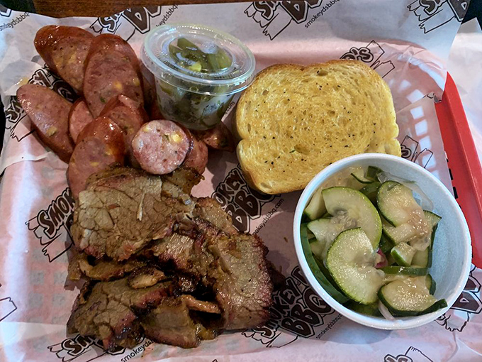 Sausage and brisket, the dynamic duo of BBQ! It's like Batman and Robin, if Batman and Robin were deliciously smoky and melt-in-your-mouth tender.