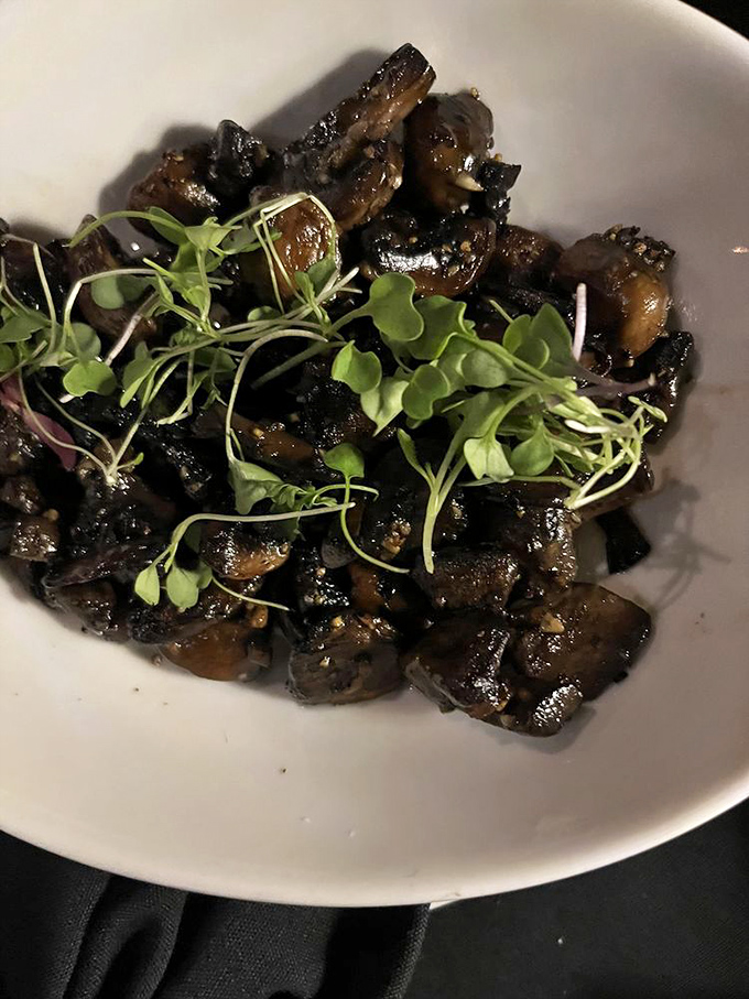 These aren't your cafeteria mushrooms. They're little umami bombs dressed up with microgreens&mdash;like tiny tuxedos for a fungi formal.