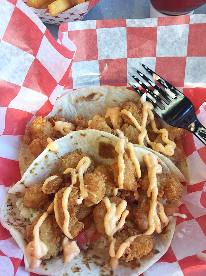 Soft tortillas cradle crispy treasures like a grandmother holding a newborn &ndash; with love, care, and a splash of sauce.