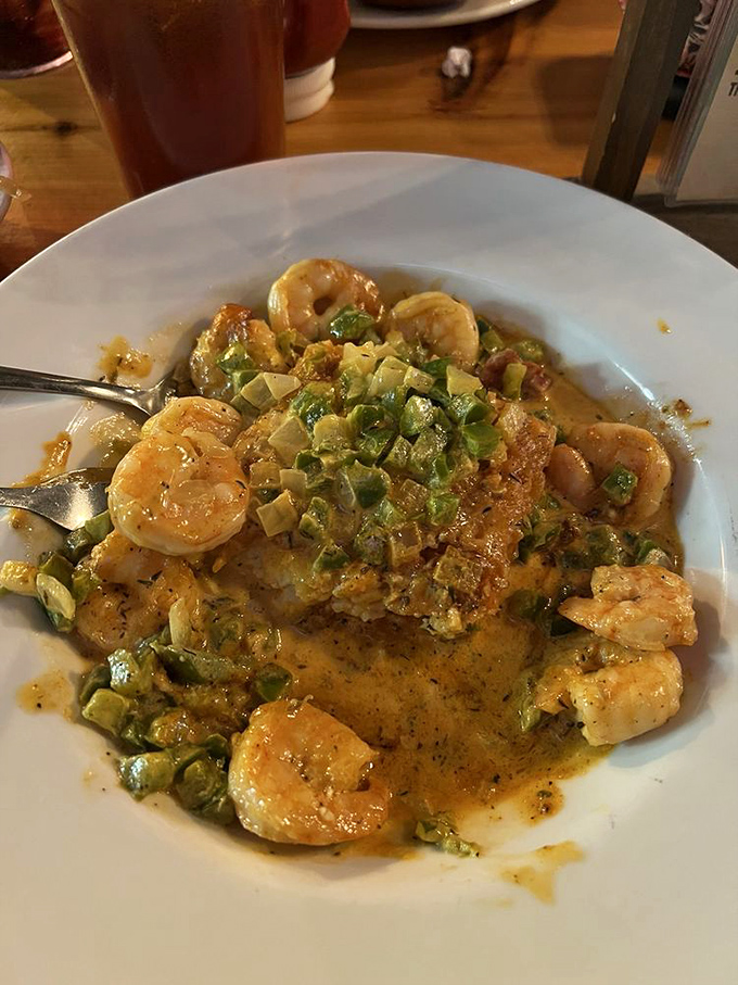 These aren't just shrimp and grits&mdash;they're tiny ocean jewels lounging on a creamy bed that would make Neptune himself request seconds.