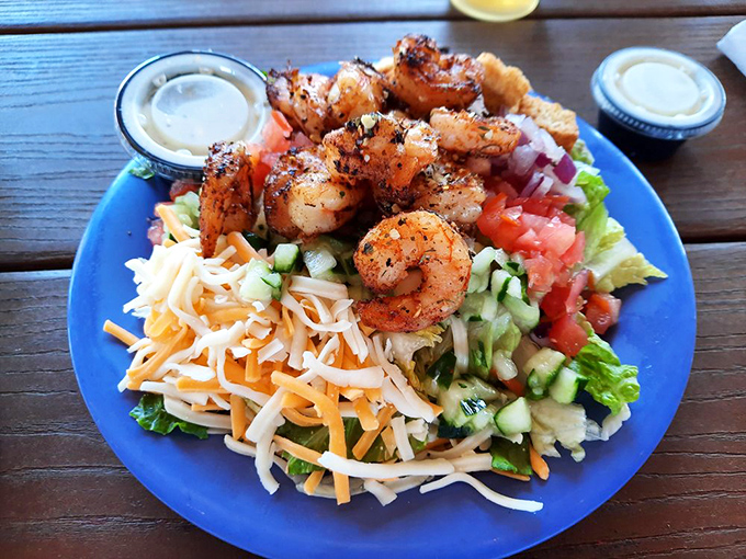 A salad that doesn't apologize for being healthy. Those blackened shrimp are the popular kids that everyone wants to hang out with.
