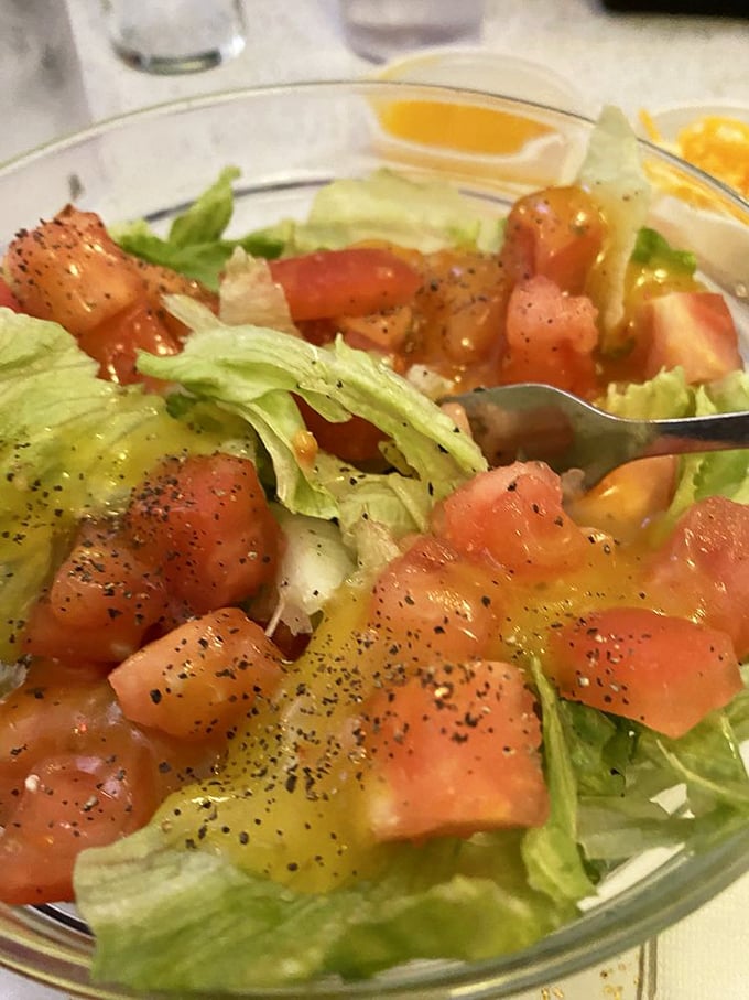 Simple house salads prove that even a century-old soda fountain understands the concept of "maybe I should have something green first."