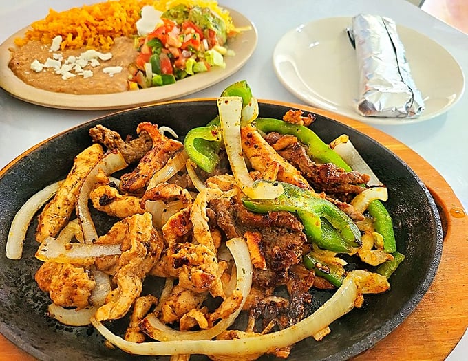 Sizzling fajitas that announce their arrival like a Broadway star. The kitchen's percussion section plays a tune your stomach can't resist.
