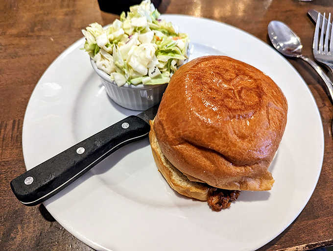 Not your cafeteria Sloppy Joe. This brioche-hugged beauty with fresh coleslaw on the side proves comfort food can graduate to gourmet without losing its soul.