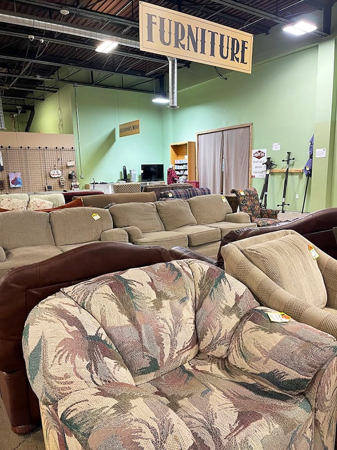 Sofa safari: spot the perfect lounging habitat in its natural environment. That floral pattern is so gloriously retro, it's practically avant-garde again.