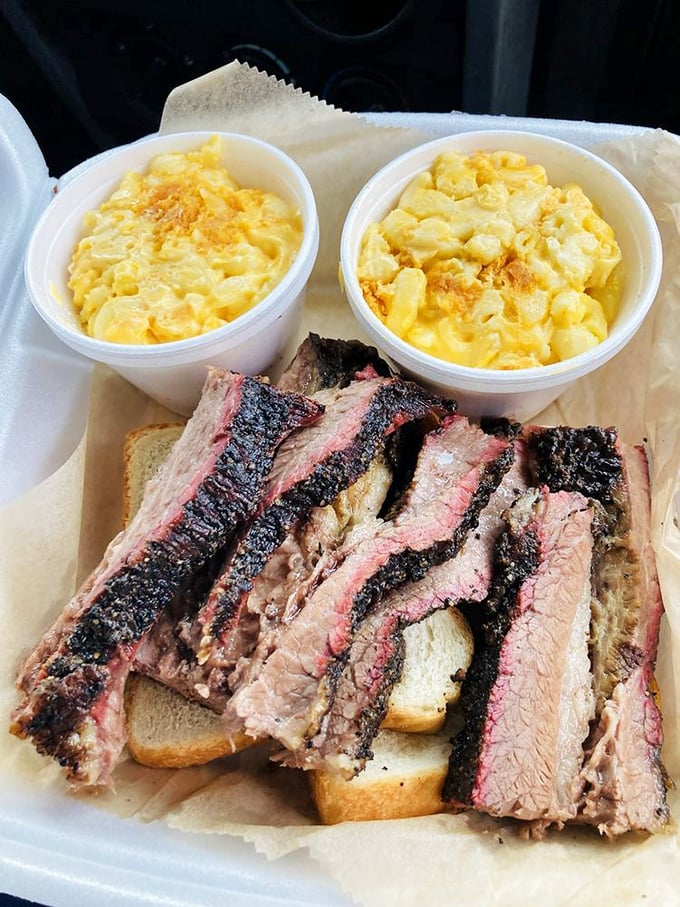 Brisket so tender it practically surrenders to your fork. That perfect pink smoke ring is the barbecue equivalent of a Michelin star.