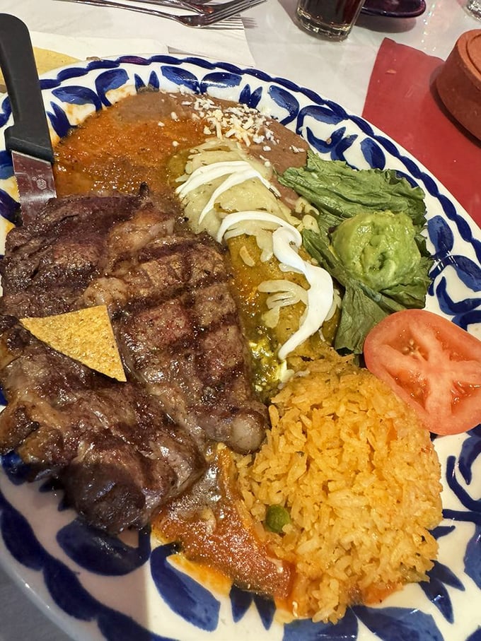 The steak and enchilada combo plate&mdash;for when you can't decide between land and land. That perfectly charred beef is singing a siren song.