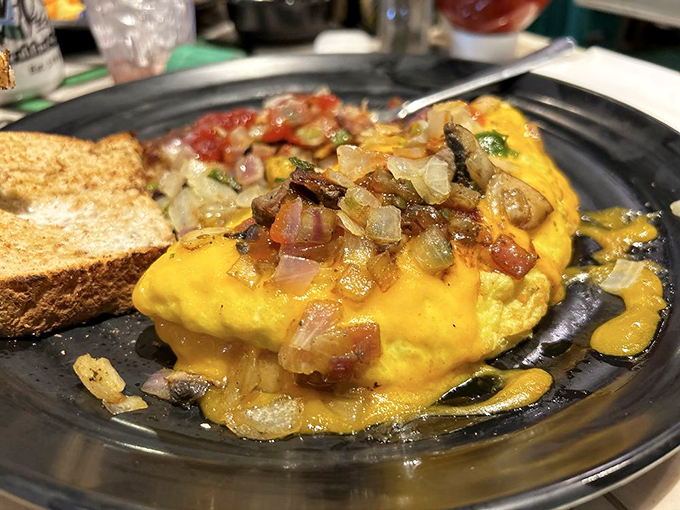This isn't just an omelet&mdash;it's a cheese-draped miracle that makes you question why you'd ever skip breakfast. Morning salvation, served hot.