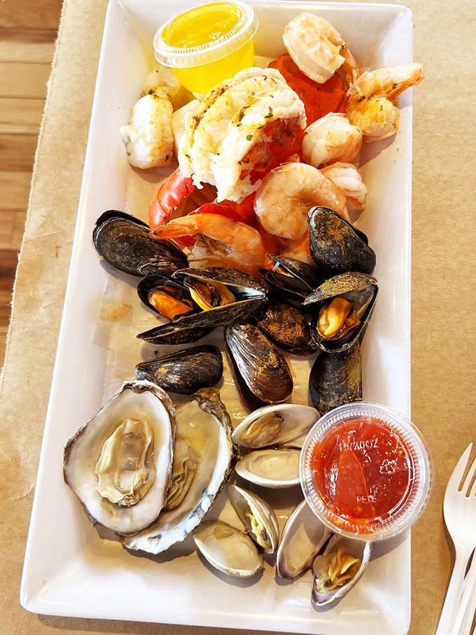 The steamed seafood sampler is like the Avengers of the ocean&mdash;mussels, clams, shrimp, and lobster assembled on one plate to save you from hunger.