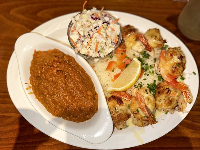 The holy trinity of Maryland dining: perfectly cooked shrimp, homemade cole slaw, and a sweet potato mash that might make you forget about dessert. Might.