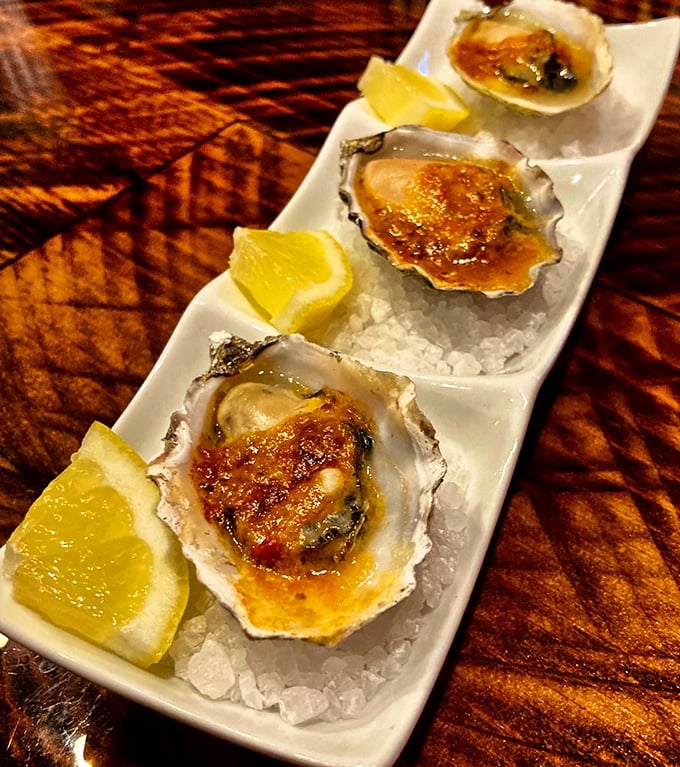 These aren't just oysters&mdash;they're little oceanic treasures, broiled to perfection and resting on beds of salt like royalty from the sea.