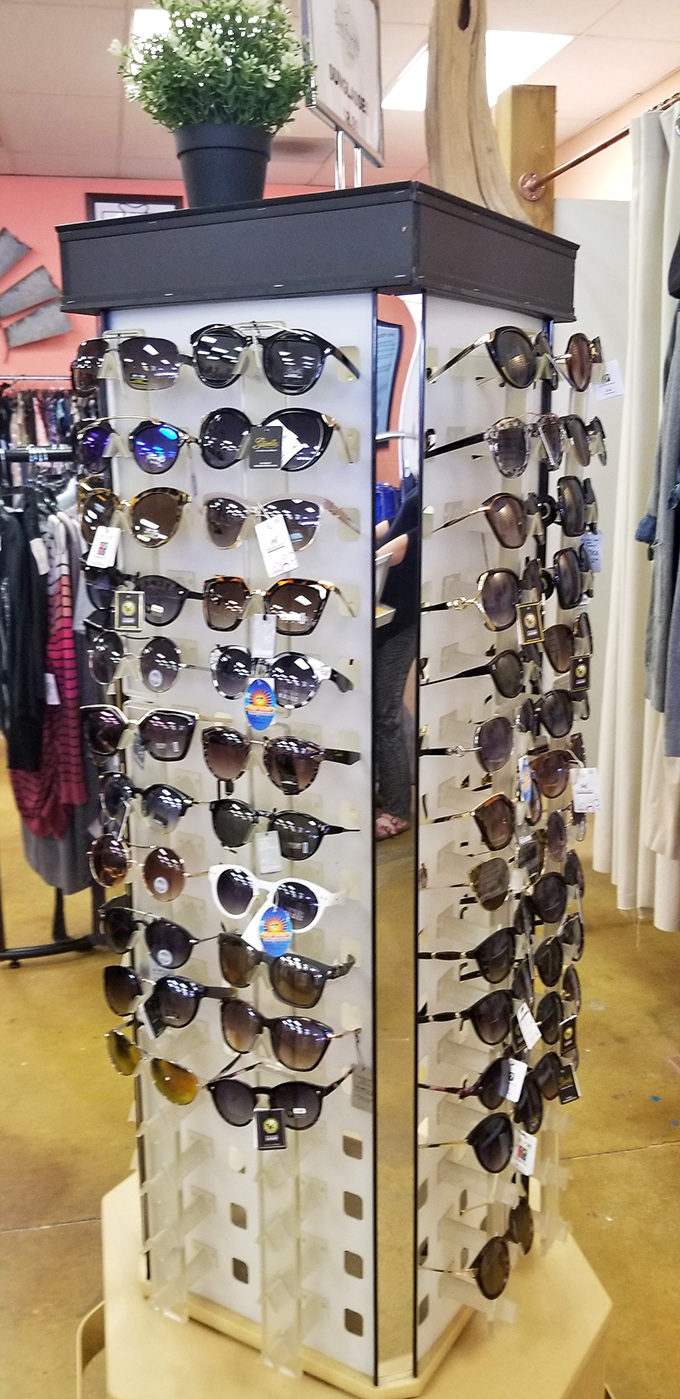 The sunglasses carousel—where you can try on new personalities for less than the cost of actual therapy.