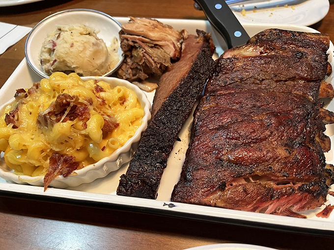Brisket with the perfect bark, pulled pork, and mac and cheese that's more indulgent than your last online shopping spree&mdash;comfort food elevated to an art form.