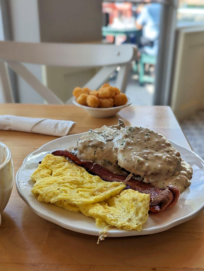 Behold the Truck Stop plate—where gravy, eggs, and bacon converge in a breakfast symphony that would make any long-haul driver weep.