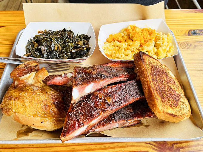 They say good things come in threes, and this plate proves it&mdash;ribs, chicken, and sides performing a synchronized flavor dance on your palate.