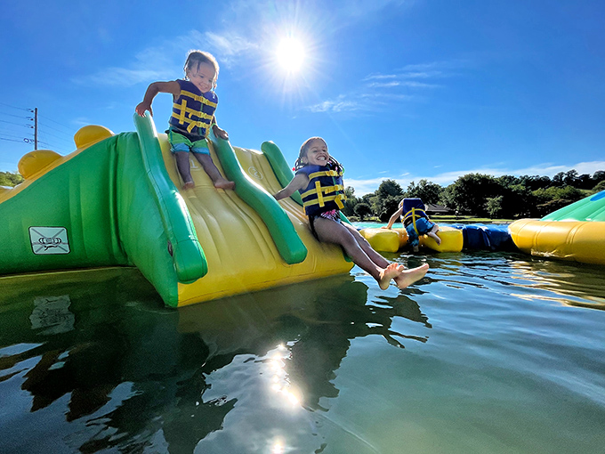 Pure joy captured: two young adventurers discover the thrill of gravity meets water. Their life-jacketed descent creates memories that will outlast any video game.
