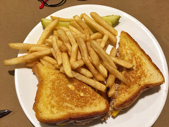 Golden-grilled perfection meets French fry abundance&mdash;this tuna melt doesn't just satisfy hunger, it creates a moment of pure sandwich bliss.