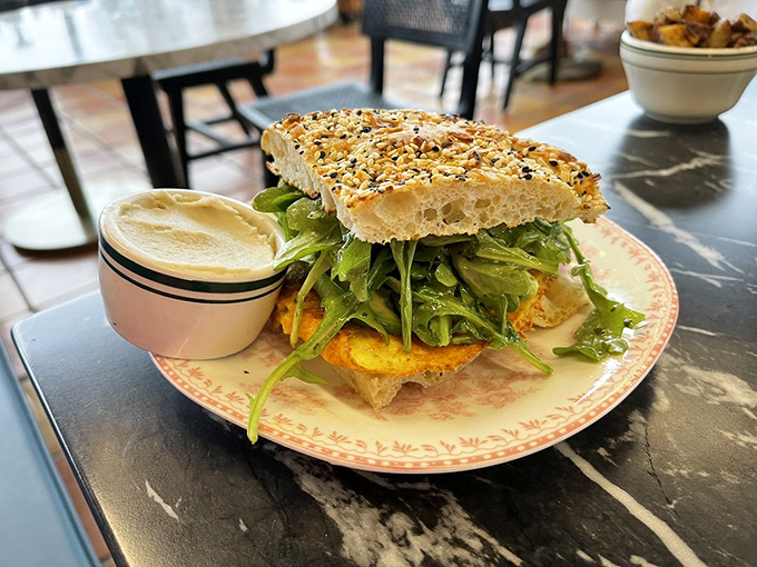 Proof that "vegan breakfast sandwich" needn't be fighting words. This beauty sports enough green to make a salad jealous while maintaining sandwich dignity.