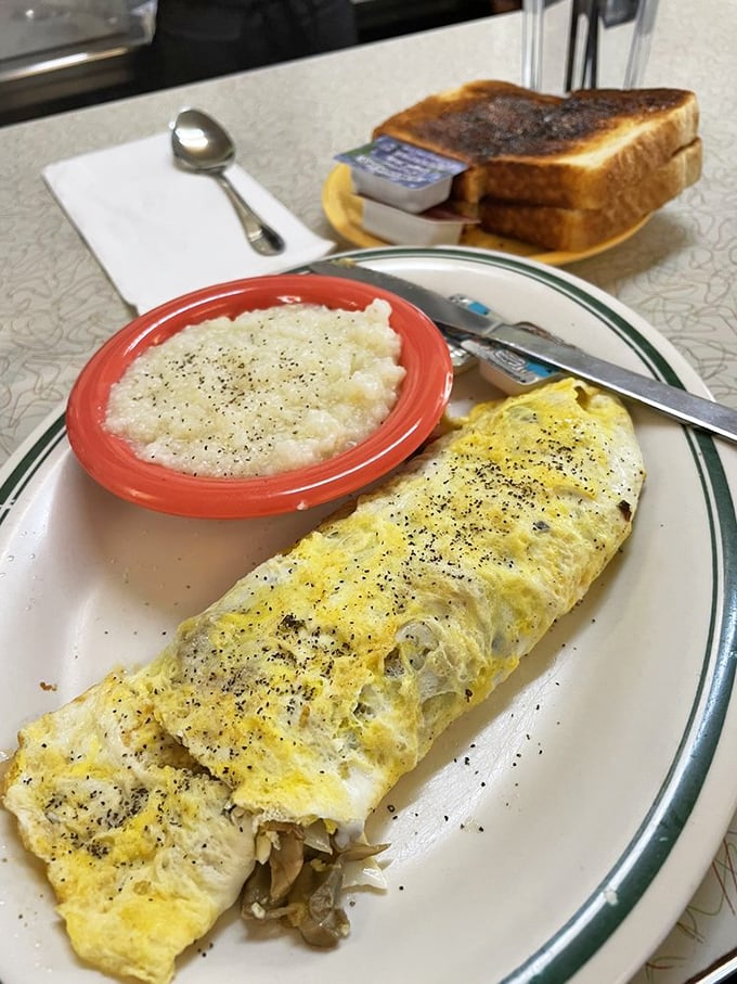 This omelet and its cloud-like companion of grits prove that vegetables can indeed have fun at breakfast too.