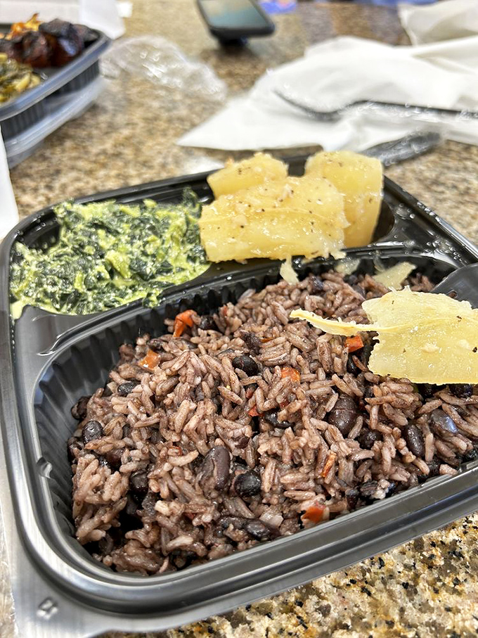 A colorful trio of Cuban classics: black beans and rice, spinach, and sweet plantains. Proof that vegetarian options can be just as soulful as their meaty counterparts.