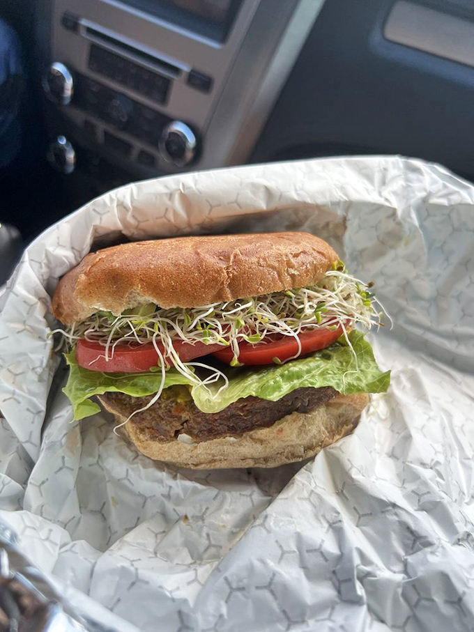 Their veggie burger defies the meat-free stereotype&mdash;overflowing with sprouts and fresh veggies that would make even carnivores consider conversion.
