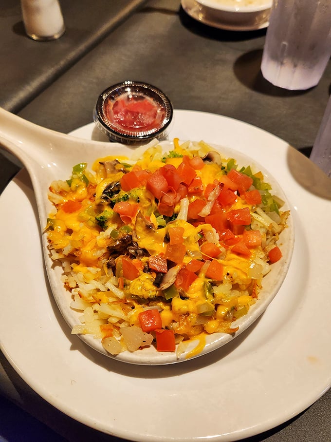 Veggie hashbrowns that prove vegetables can party too. That melted cheddar blanket is tucking in all those colorful veggies for a flavor nap.