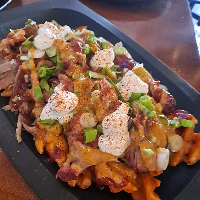Loaded waffle fries that could make a cardiologist weep&mdash;worth every delicious calorie and momentary guilt.