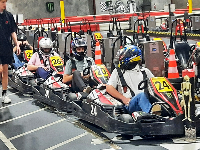 Helmets on, game faces activated. These drivers are contemplating whether to channel their inner Andretti or embrace their natural Griswold.