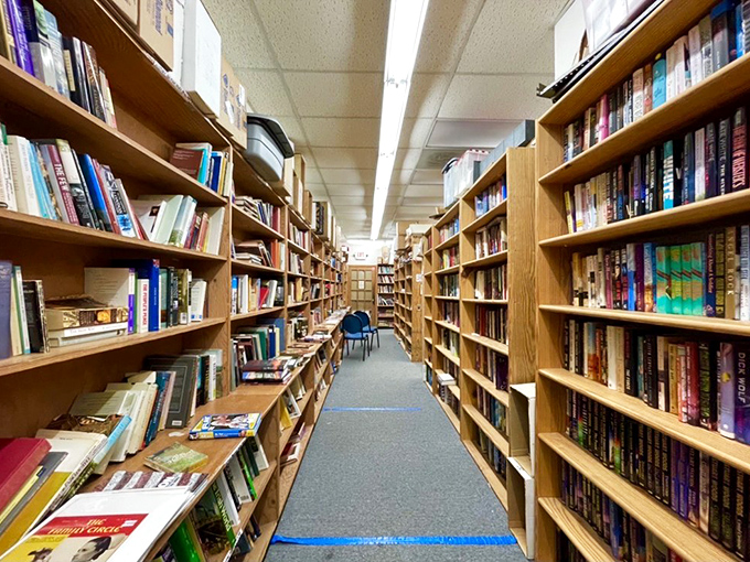 Book lovers' version of social distancing since long before it was trendy. That lone chair isn't lonely&mdash;it's just surrounded by better company.