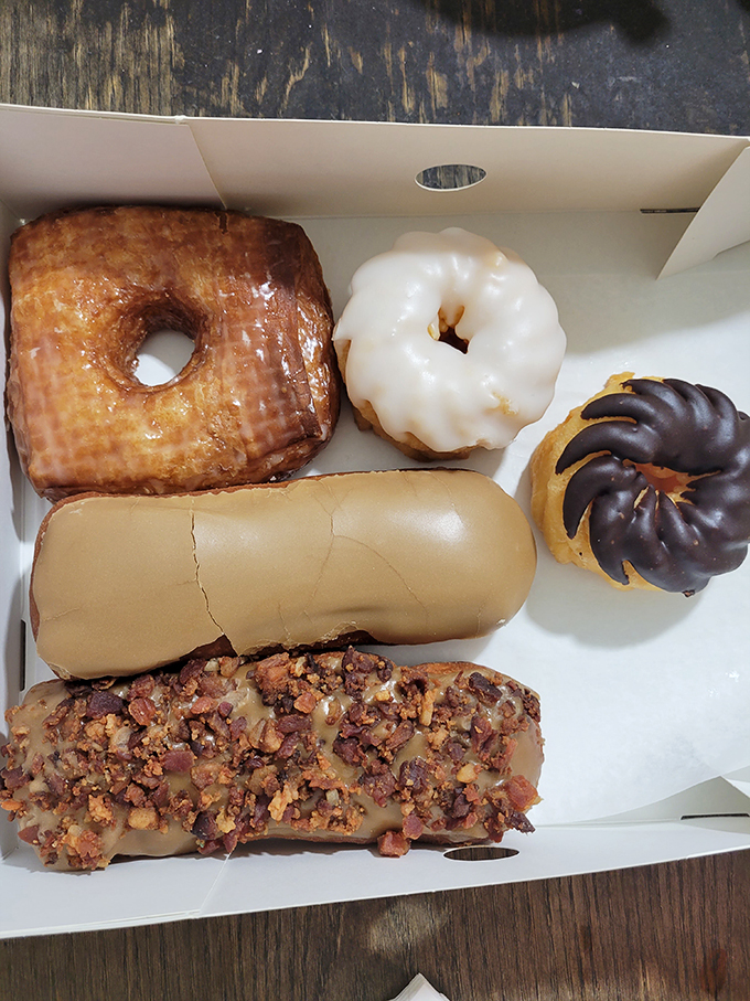 A box of Randy's is like the United Nations of donuts &ndash; different shapes, colors, and fillings all coexisting in delicious harmony.