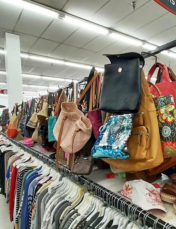 Handbags dangle like exotic fruit, a harvest of styles from practical totes to sequined evening clutches&mdash;fashion's second act.