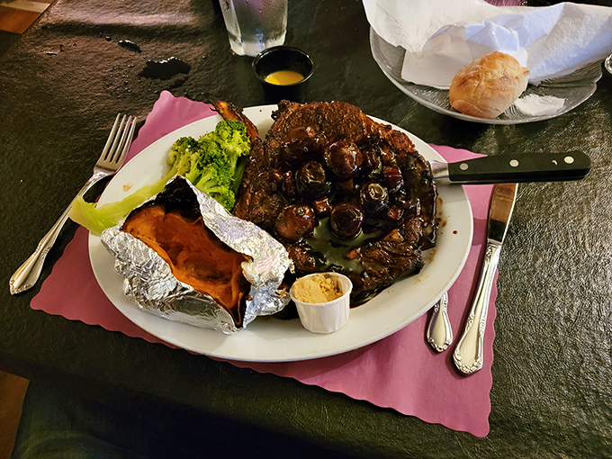 Not just any steakhouse sides&mdash;a loaded baked potato, crab cake, and green beans that respect the main event without being mere afterthoughts.