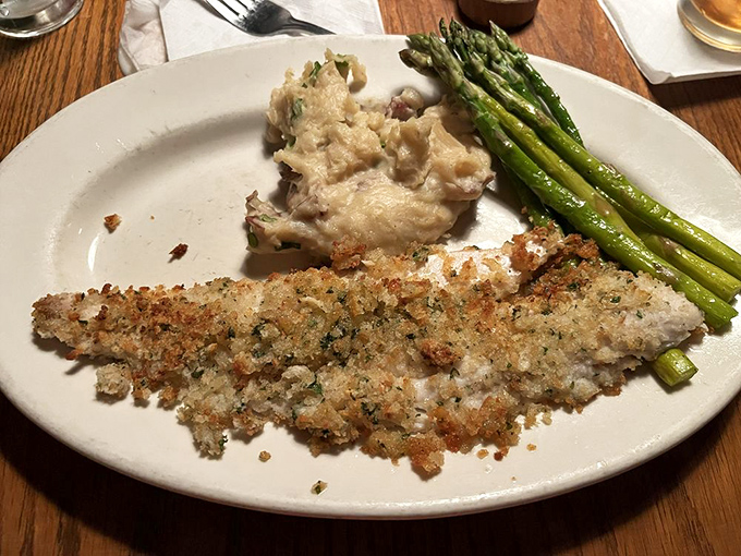 Seafood gets the royal treatment too. This baked fish with its golden crust proves Mountain Jacks isn't just playing the meat game.