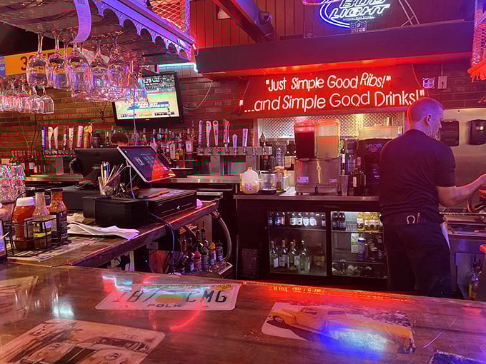 "Just Simple Good Ribs and Simple Good Drinks"—the bar's neon promise isn't poetry, but after tasting either, you'll swear it should be.