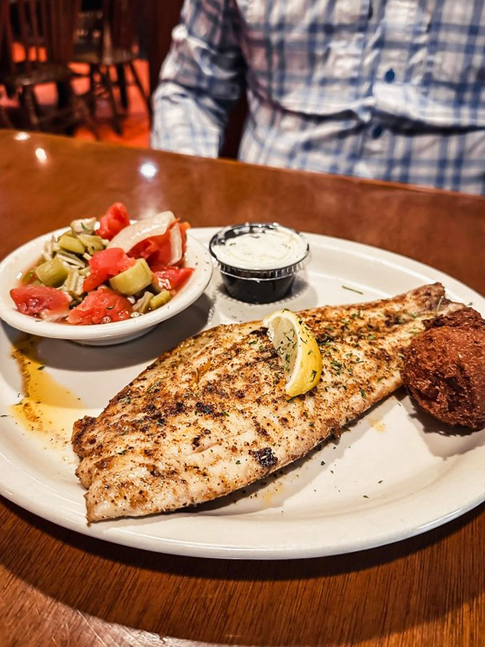Ocean-to-table perfection with a Southern accent. This blackened fish with garden-fresh tomato salad proves Florida's seafood prowess extends well beyond the coastline.