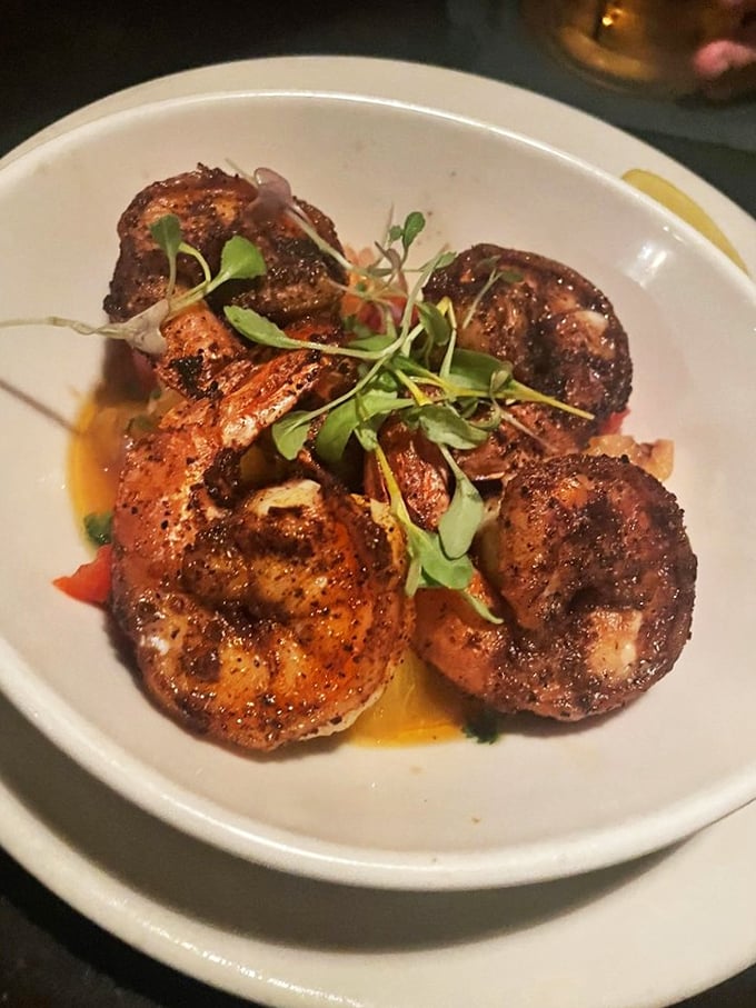 These blackened shrimp aren't just cooked&mdash;they're transformed into oceanic flavor bombs, garnished with microgreens for that touch of culinary sophistication.