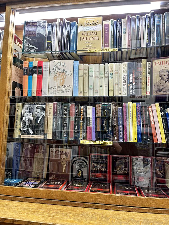 The Fitzgerald collection behind glass&mdash;like literary celebrities in their own VIP section, too precious for casual browsing.