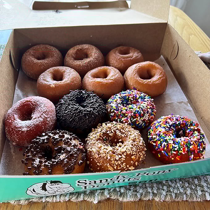 The Sandy Pony dozen&mdash;a kaleidoscope of flavors that makes sharing both necessary and nearly impossible. Count them quickly before one mysteriously disappears.